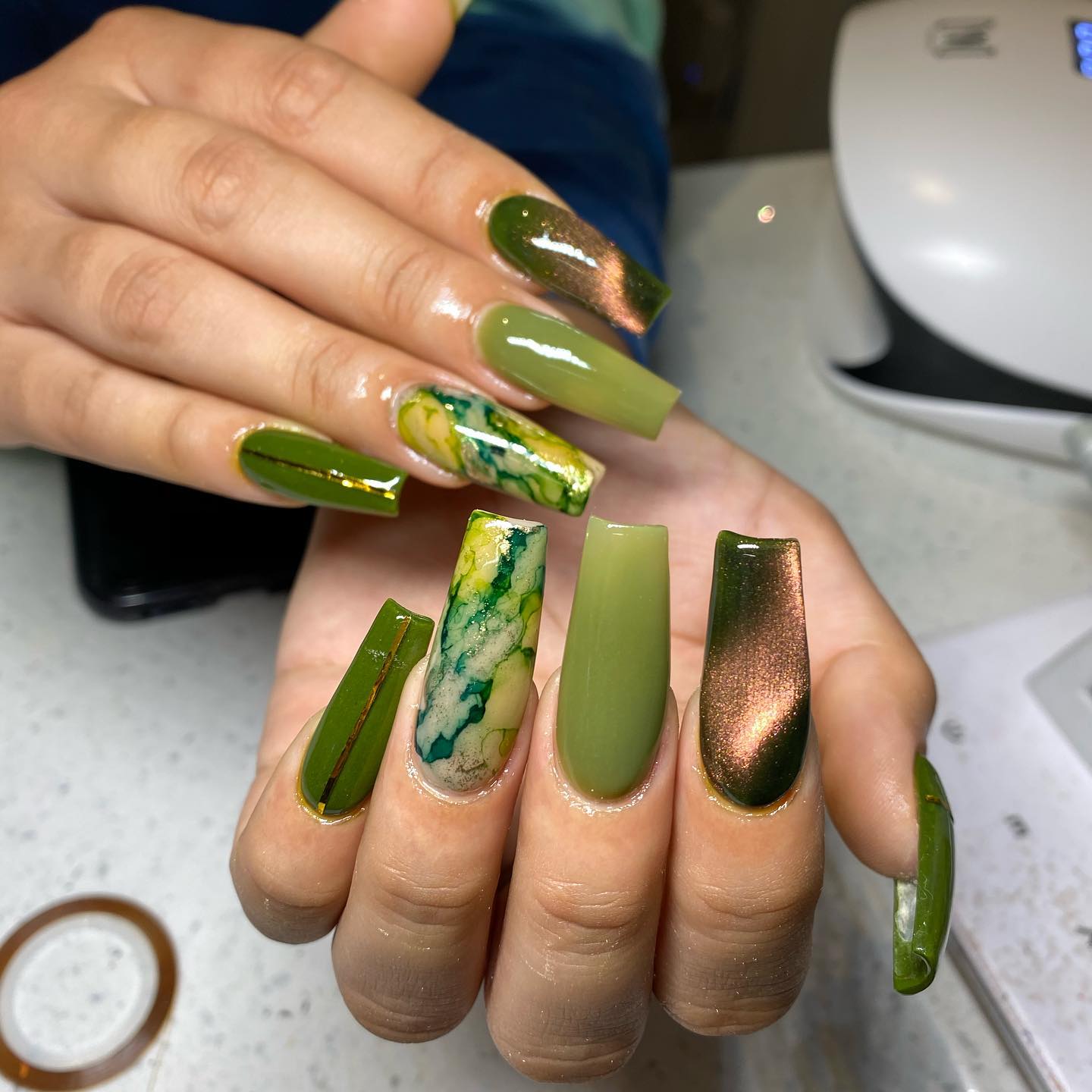 22 Olive Green Nail Designs for a Refined Manicure